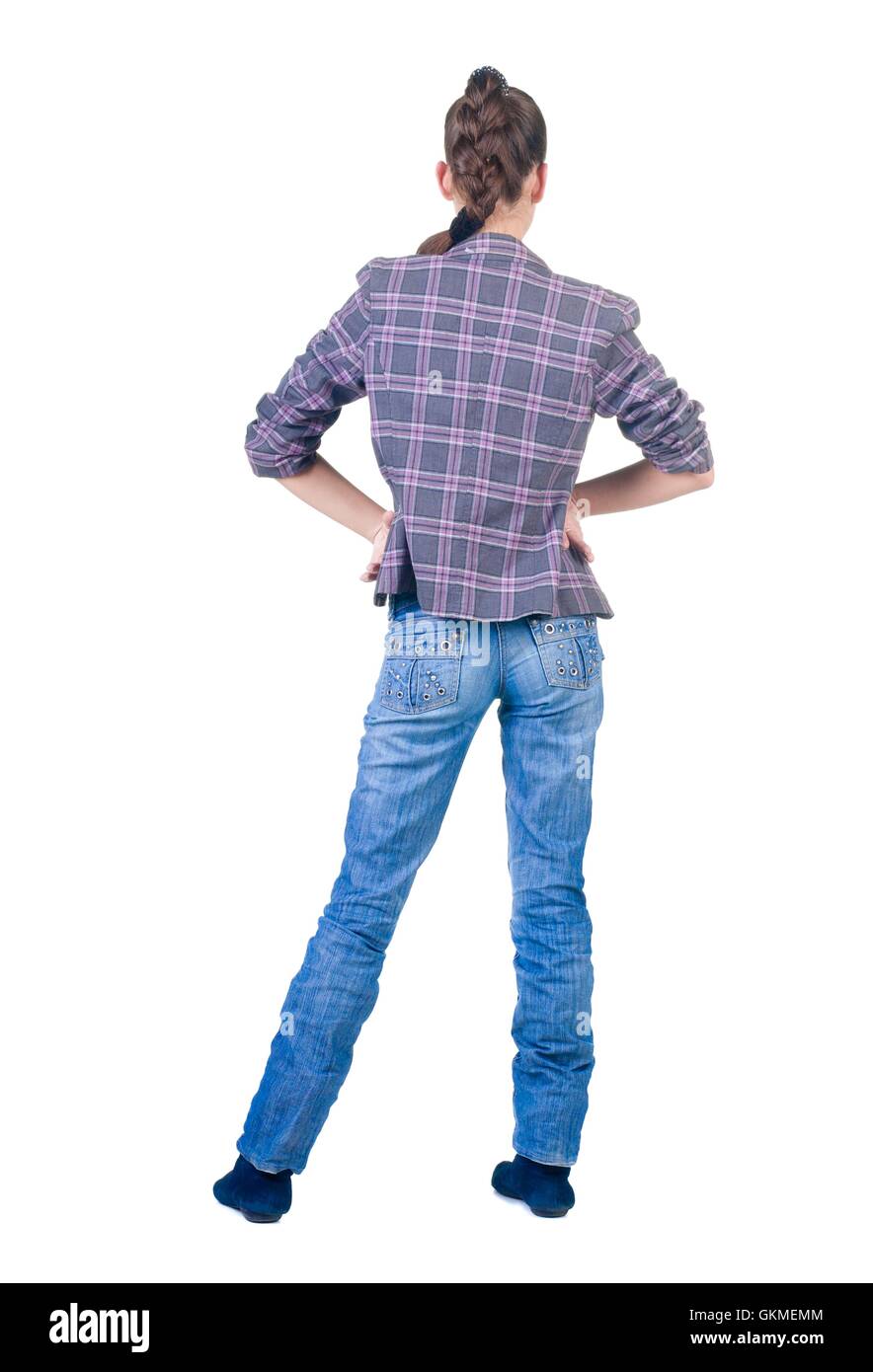 Beautiful young brunette looks in distance. Rear view Stock Photo - Alamy