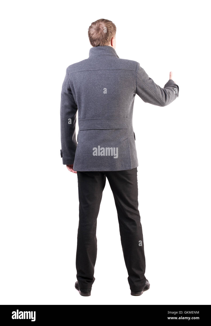 Back view of business man shows thumbs up Stock Photo - Alamy