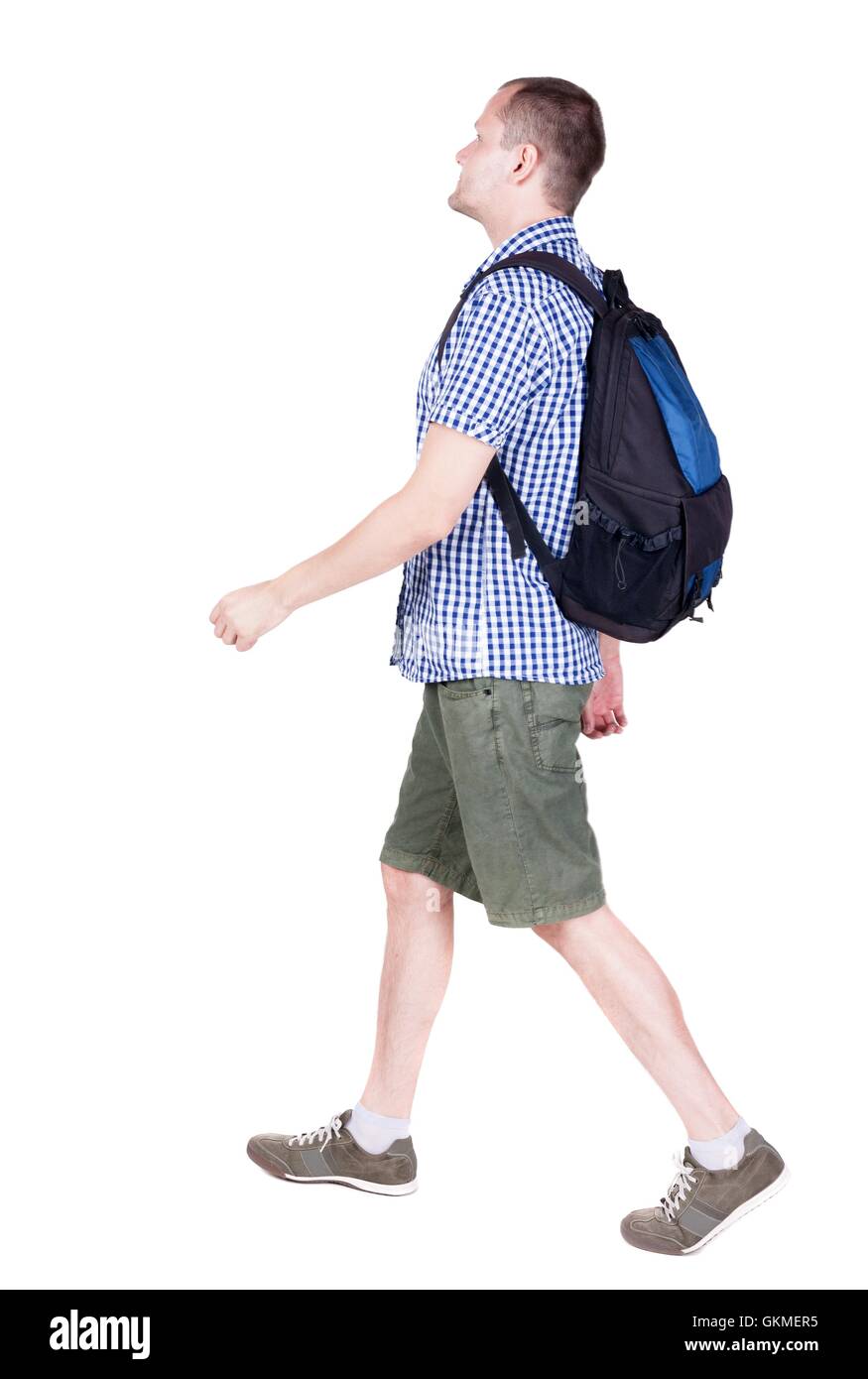 back view of walking man with backpack Stock Photo - Alamy