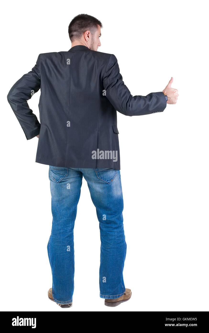 Businessman thumbs up. rear view Stock Photo - Alamy