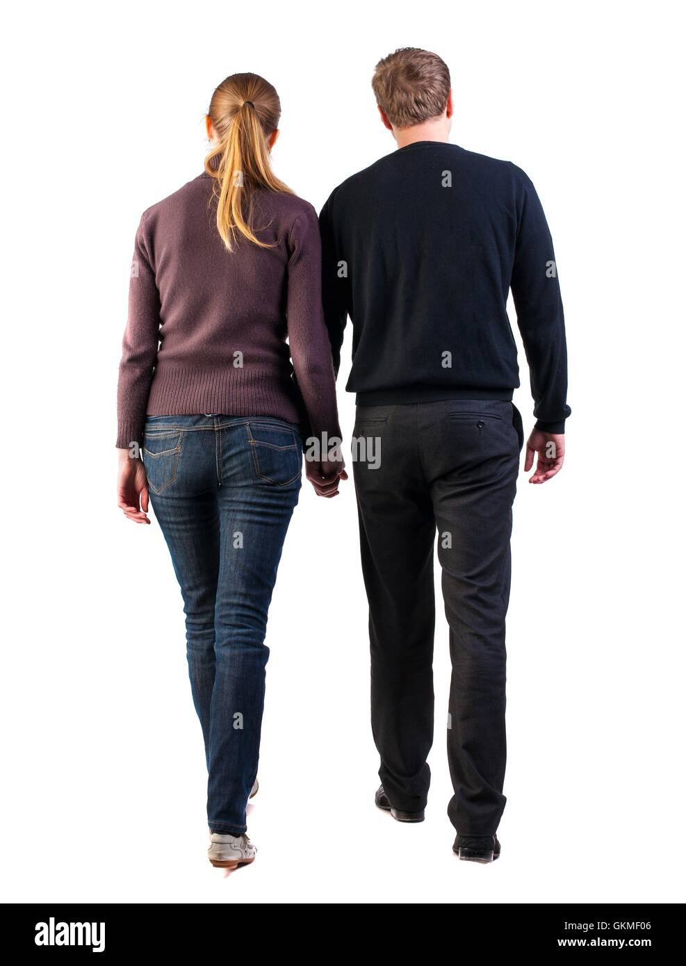 Back view of walking young couple Stock Photo - Alamy