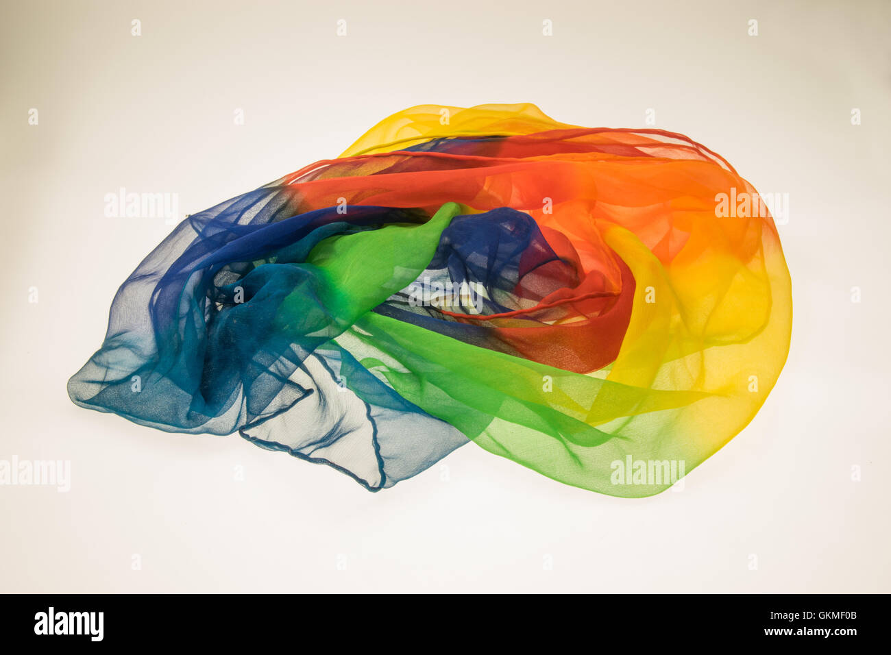 rainbow-colored scarf isolated on bright background Stock Photo - Alamy