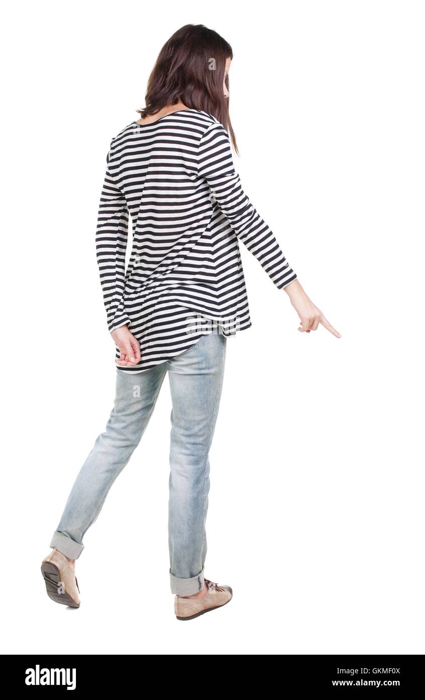 Back view of pointing woman in frock Stock Photo - Alamy