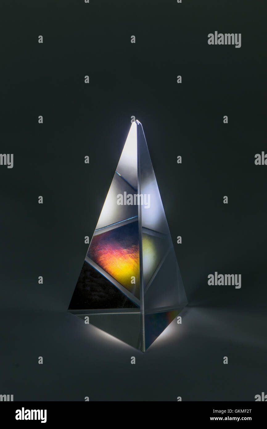 light refraction in a triangular glass prism Stock Photo - Alamy