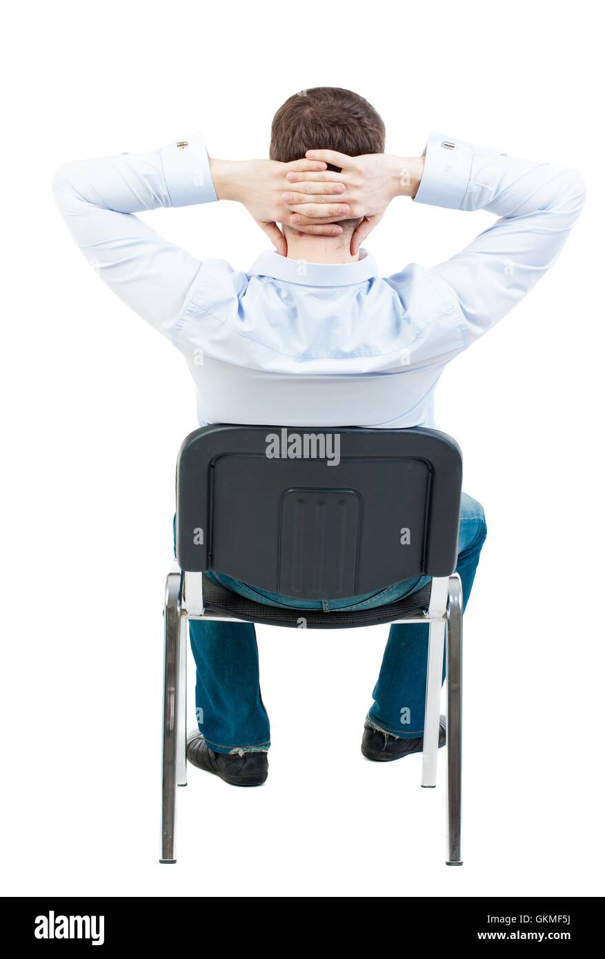 back view of business man sitting on chair Stock Photo - Alamy