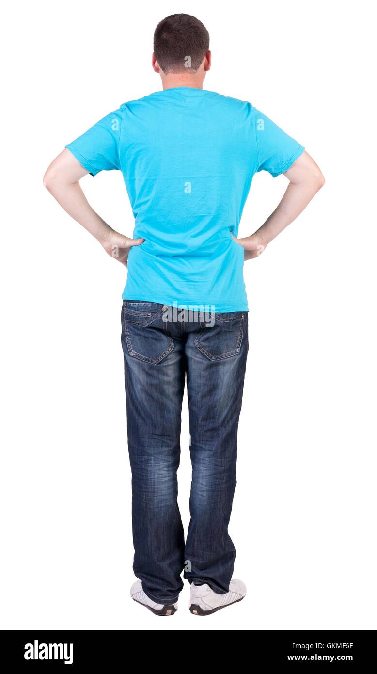 Back view of young men in blue t-shirt and jeans Stock Photo - Alamy
