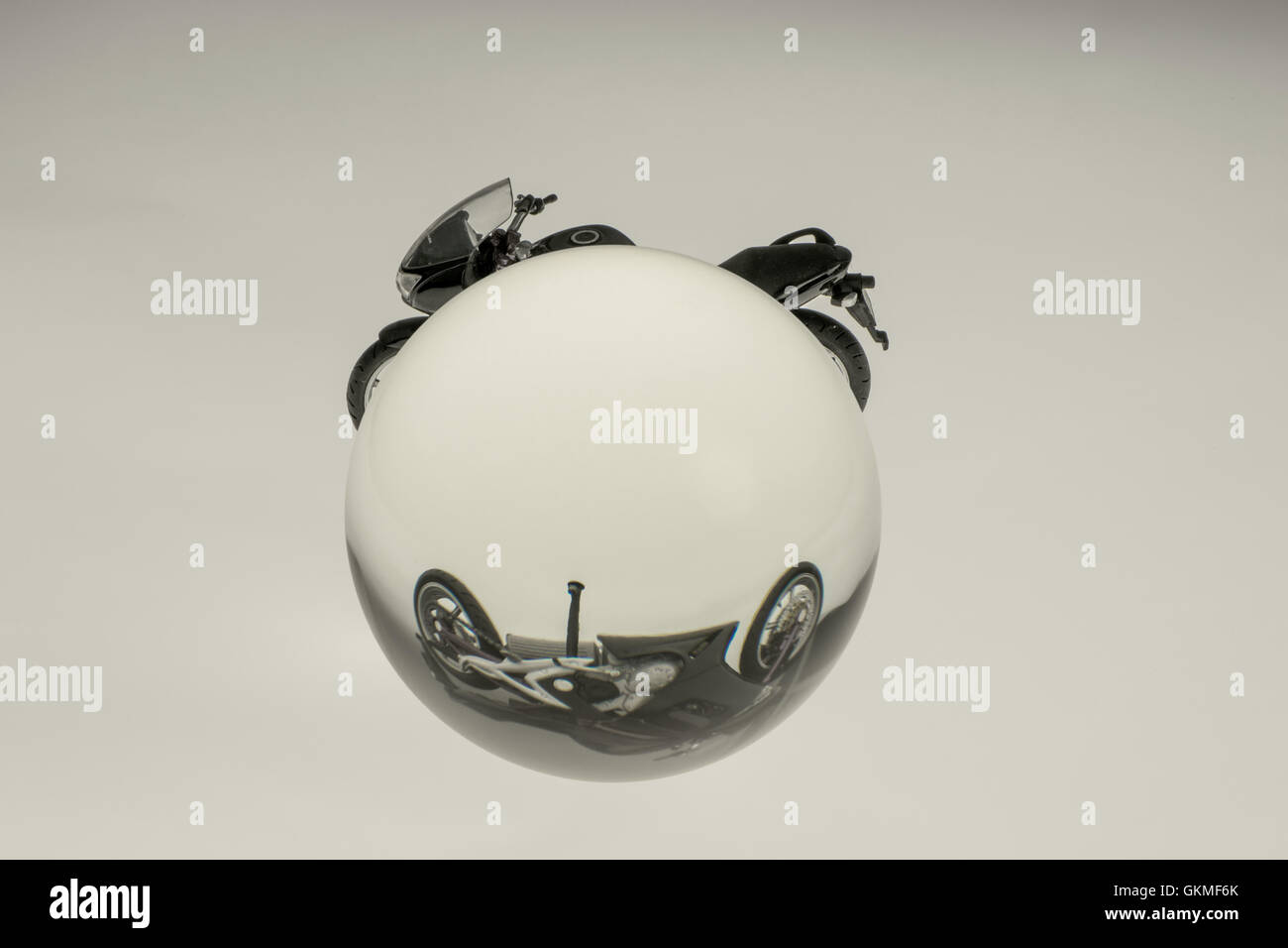 refraction of a motorbike in a glass sphere Stock Photo - Alamy