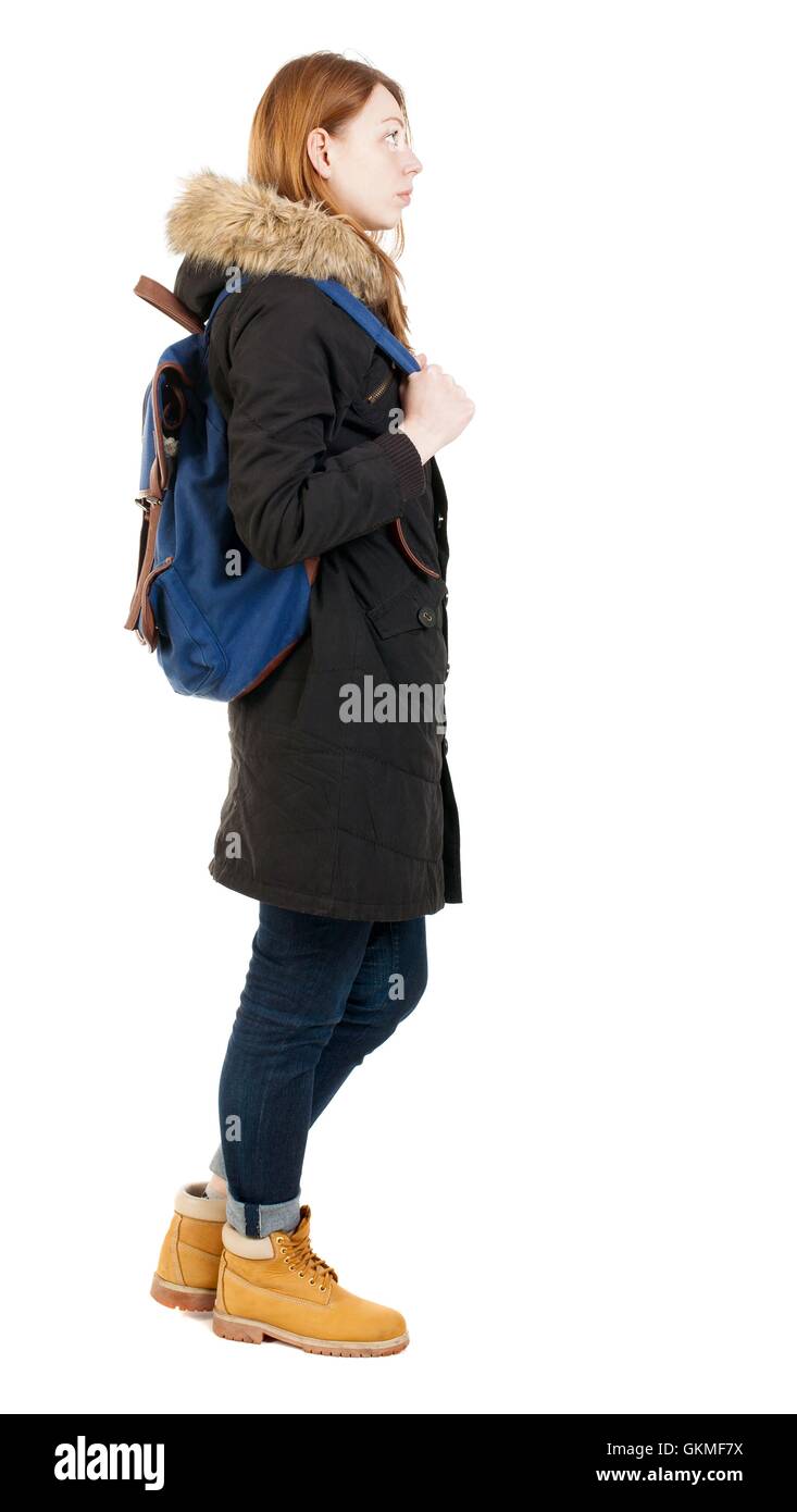 Back view woman in winter jacket with backpack Stock Photo - Alamy