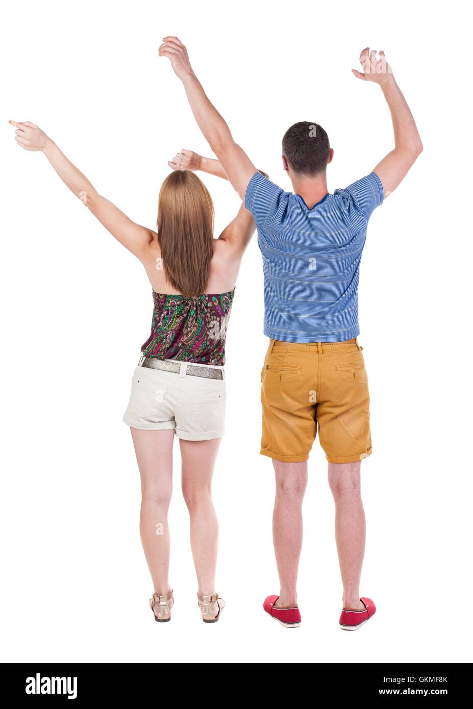 Back view of joyful couple celebrating victory hands up Stock Photo - Alamy