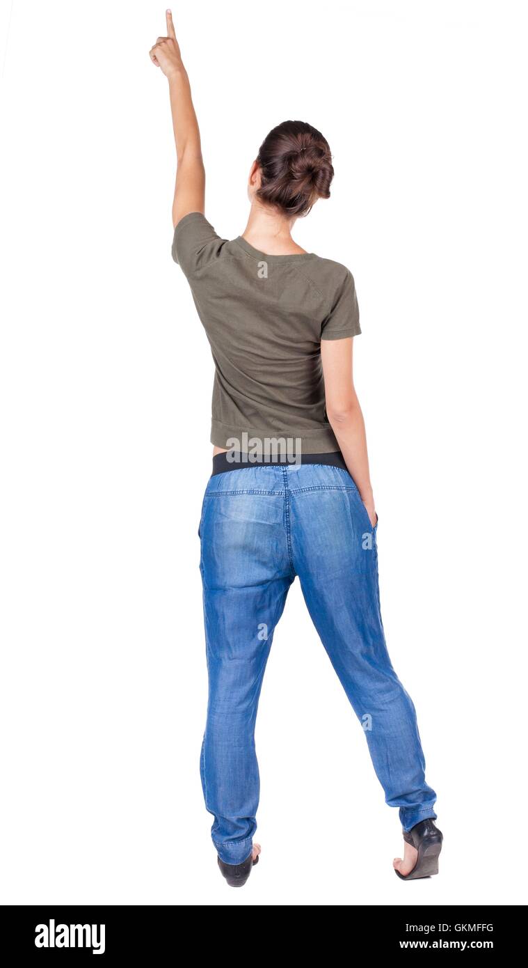 Back view of pointing woman Stock Photo - Alamy