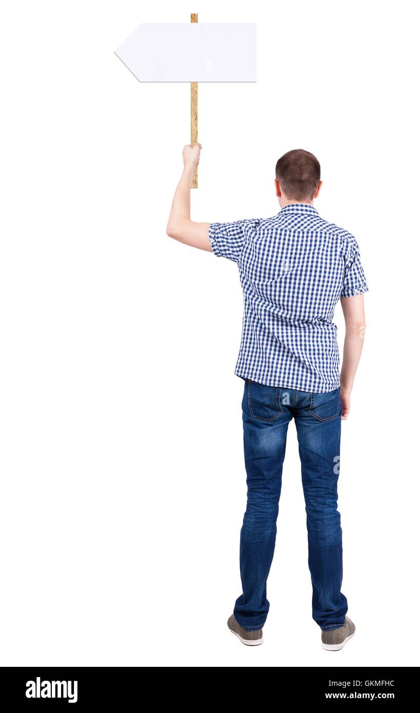 Back view of man showing a sign board Stock Photo - Alamy