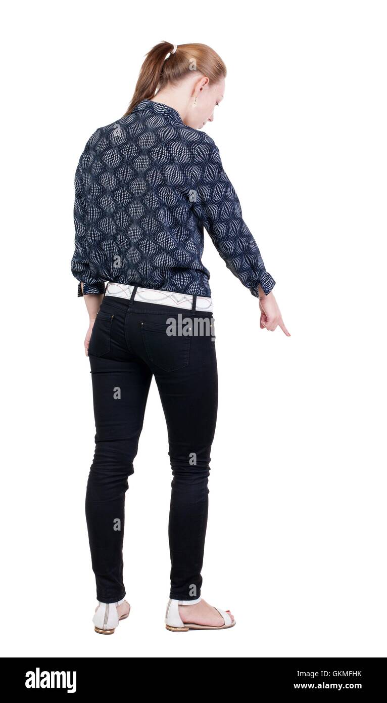 Back view of pointing woman Stock Photo - Alamy