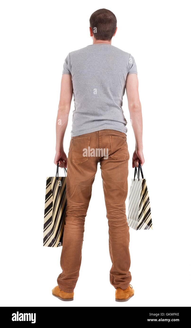 Back view of handsome man with shopping bags Stock Photo - Alamy