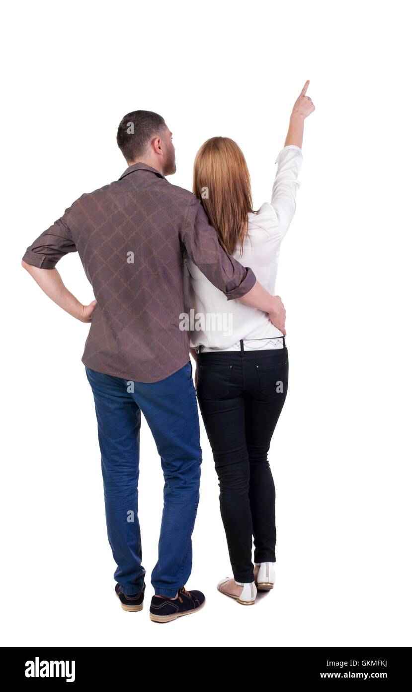 young couple pointing Stock Photo - Alamy