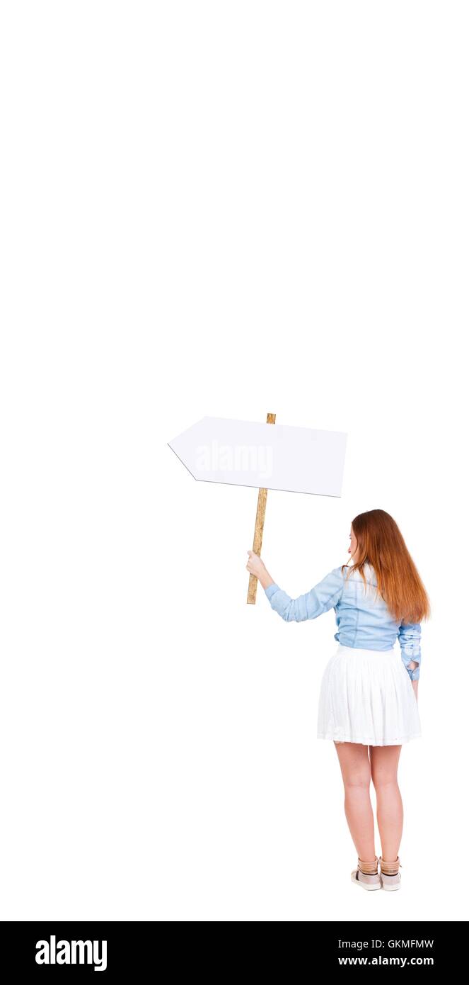 Back view of woman showing a sign board Stock Photo - Alamy