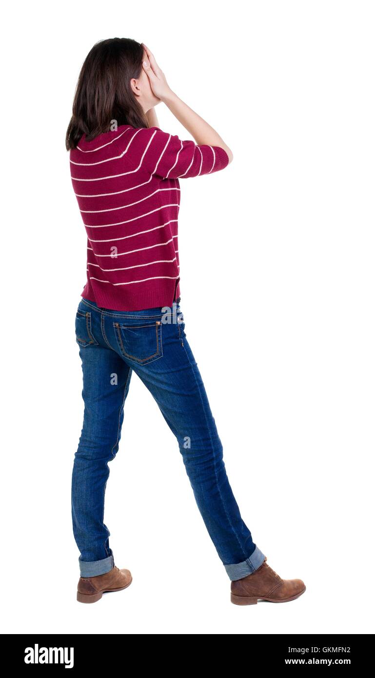 Back view of shocked woman in blue jeans Stock Photo - Alamy