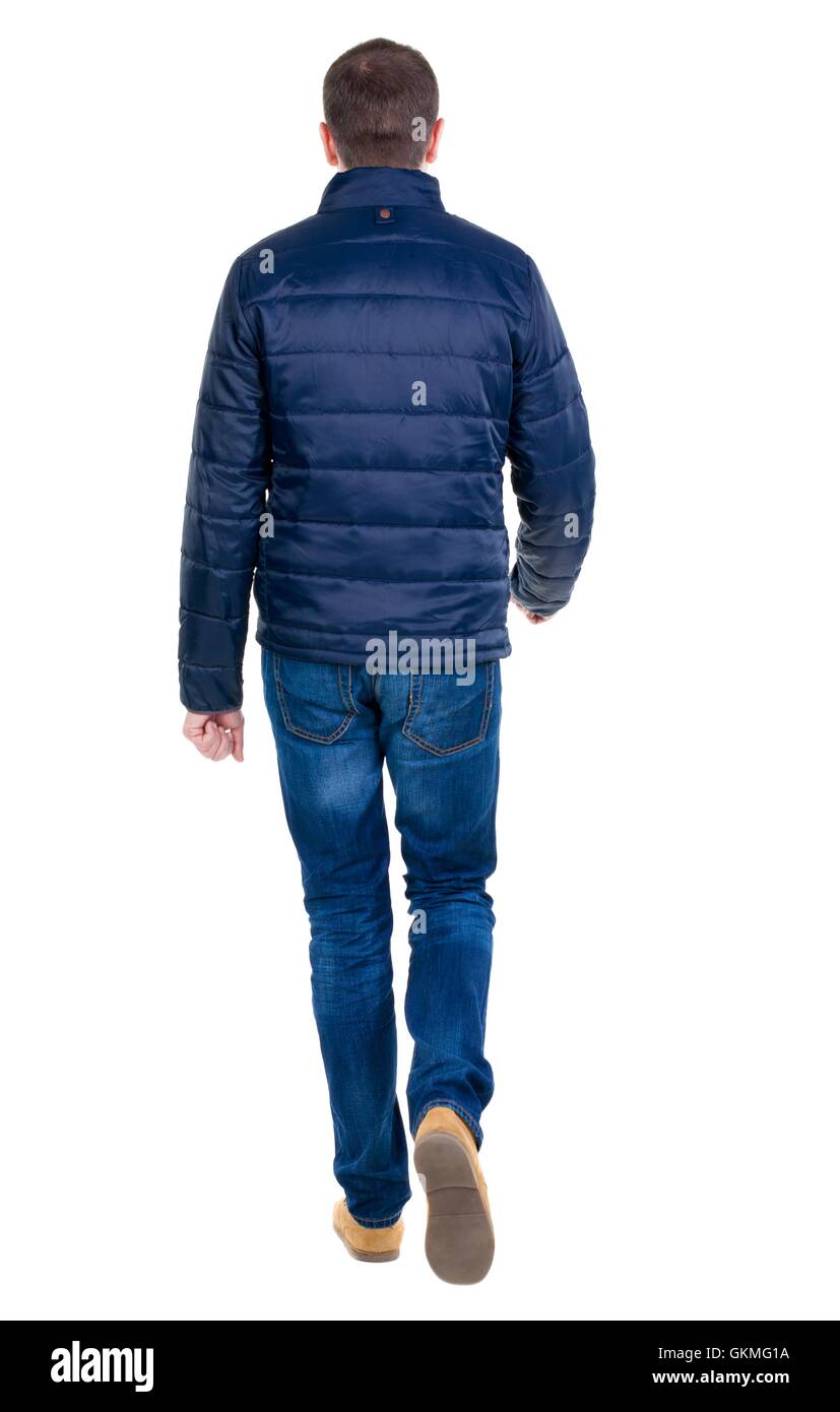 Back view of going handsome man in jeans and jacket Stock Photo - Alamy