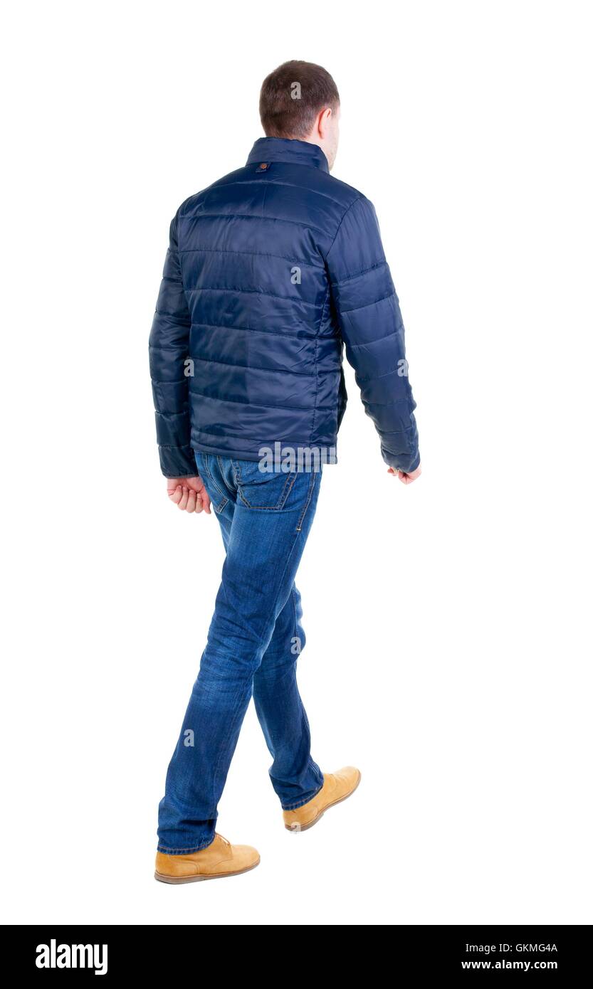 Back view of going handsome man in jeans and jacket Stock Photo - Alamy