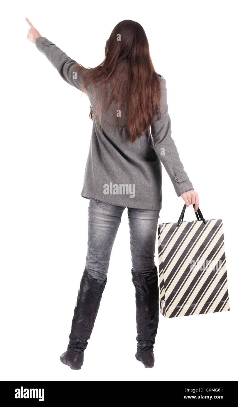 Back view of pointing woman Stock Photo - Alamy