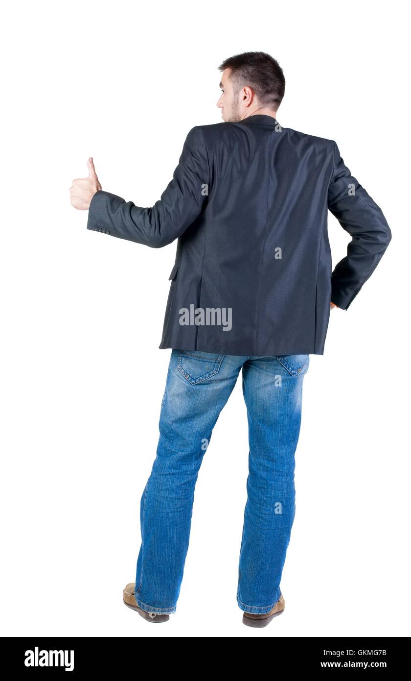Businessman thumbs up. rear view Stock Photo - Alamy