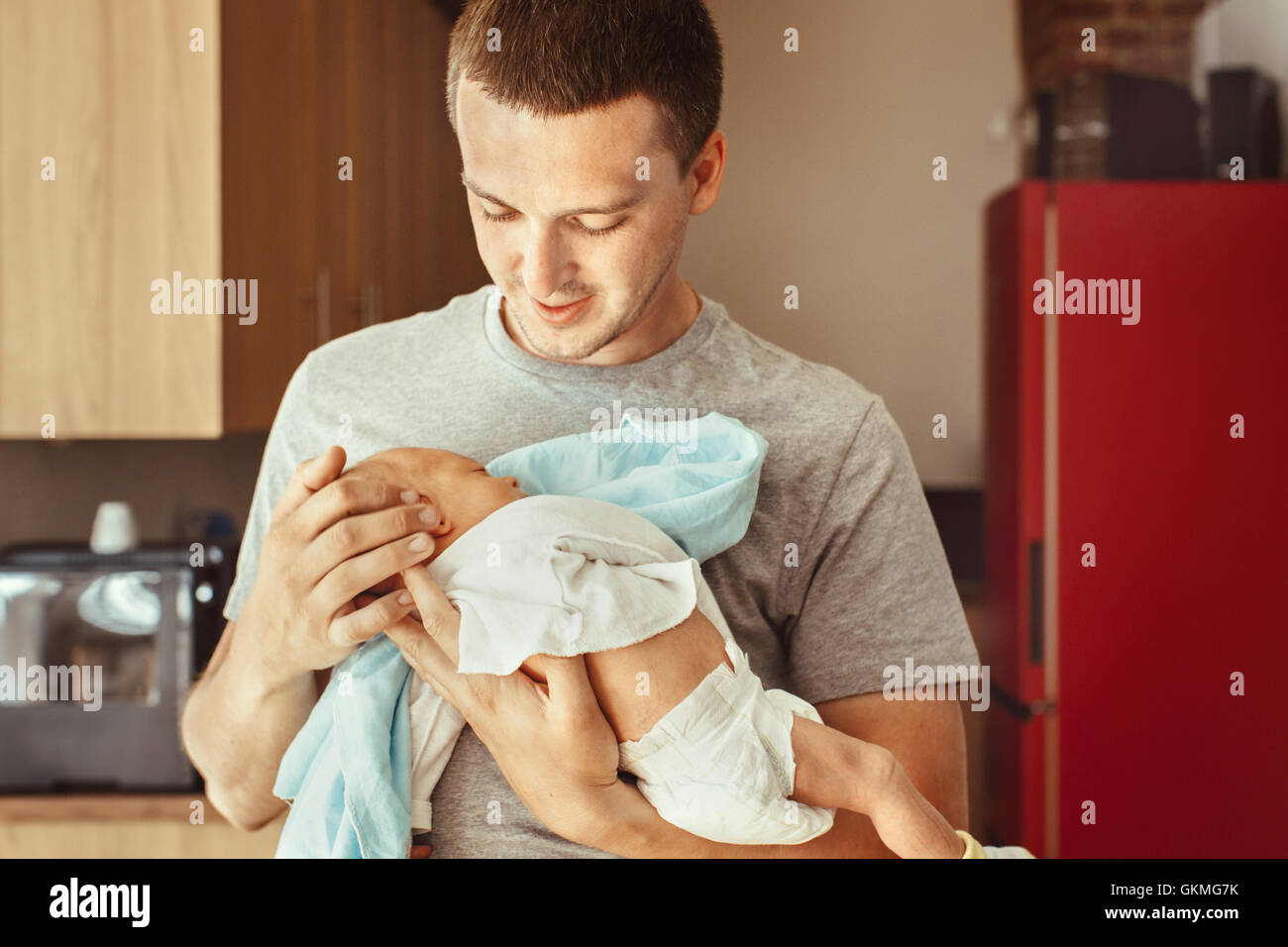 Child with father hi-res stock photography and images - Alamy