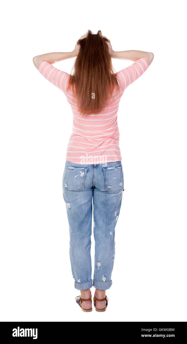 Back view of shocked woman Stock Photo - Alamy