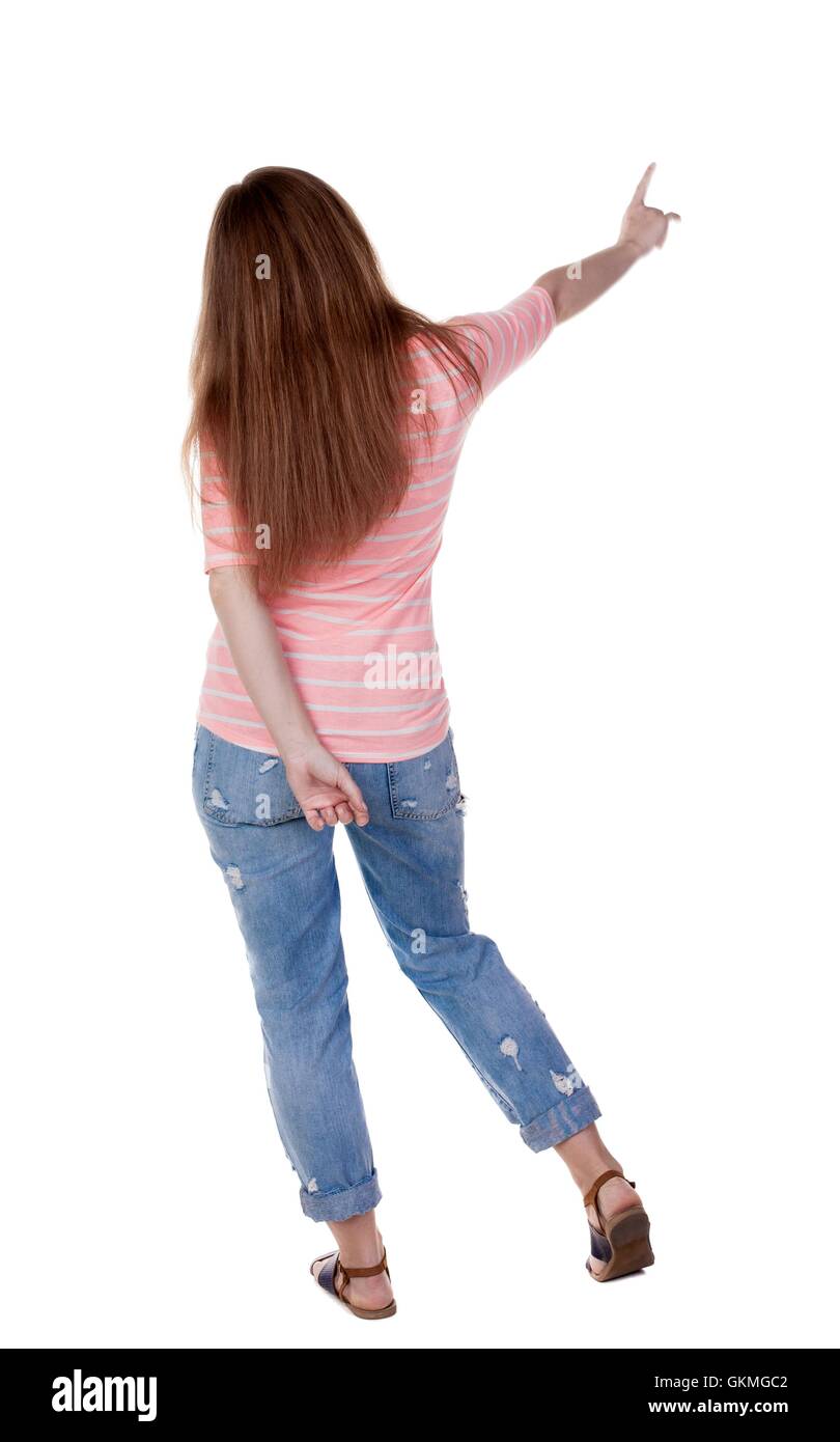 Back view of pointing woman Stock Photo - Alamy