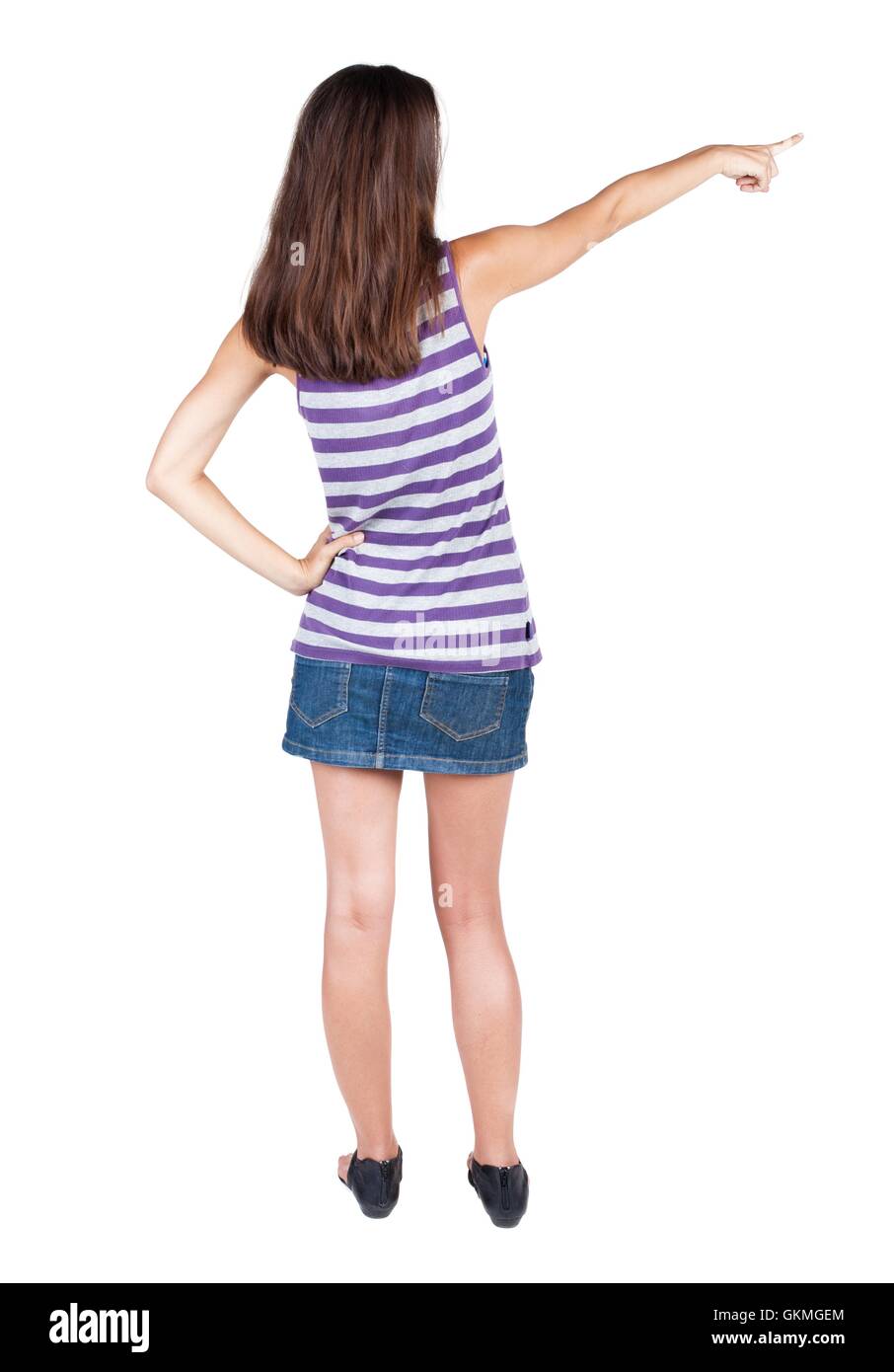 Back view of pointing woman Stock Photo - Alamy