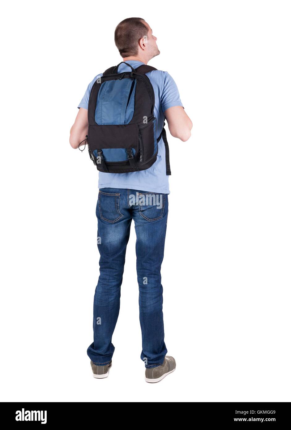 Back view of man with backpack looking up Stock Photo - Alamy