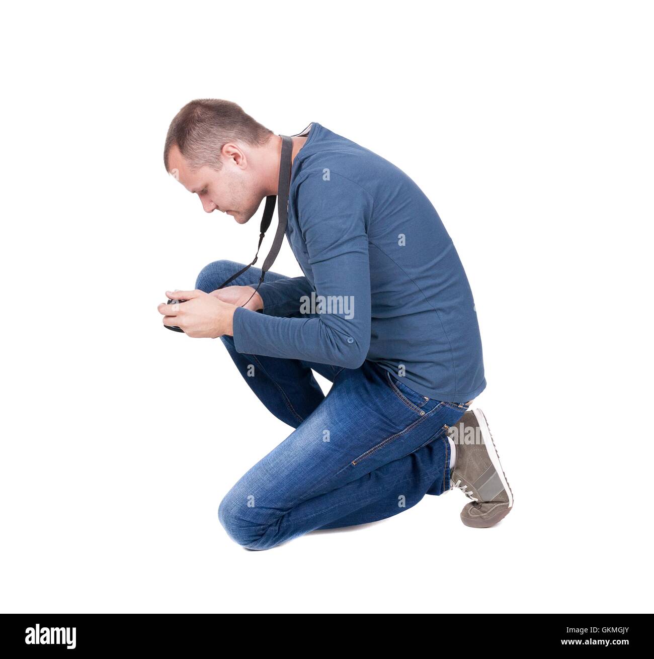 Back view of man photographing Stock Photo - Alamy