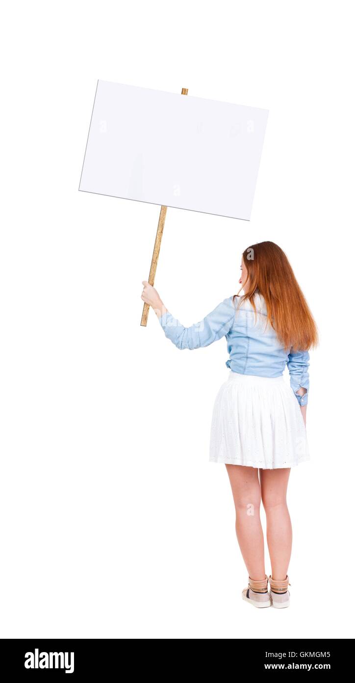 Back view of woman showing a sign board Stock Photo - Alamy