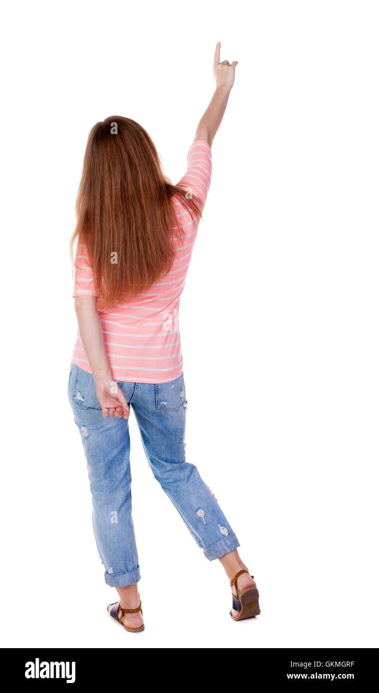 Back view of pointing woman Stock Photo - Alamy