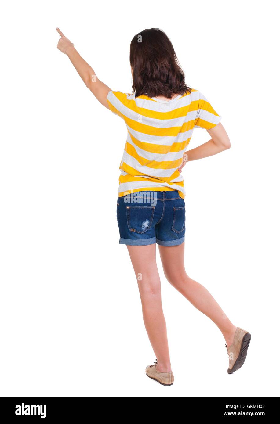 Back view of pointing woman Stock Photo - Alamy