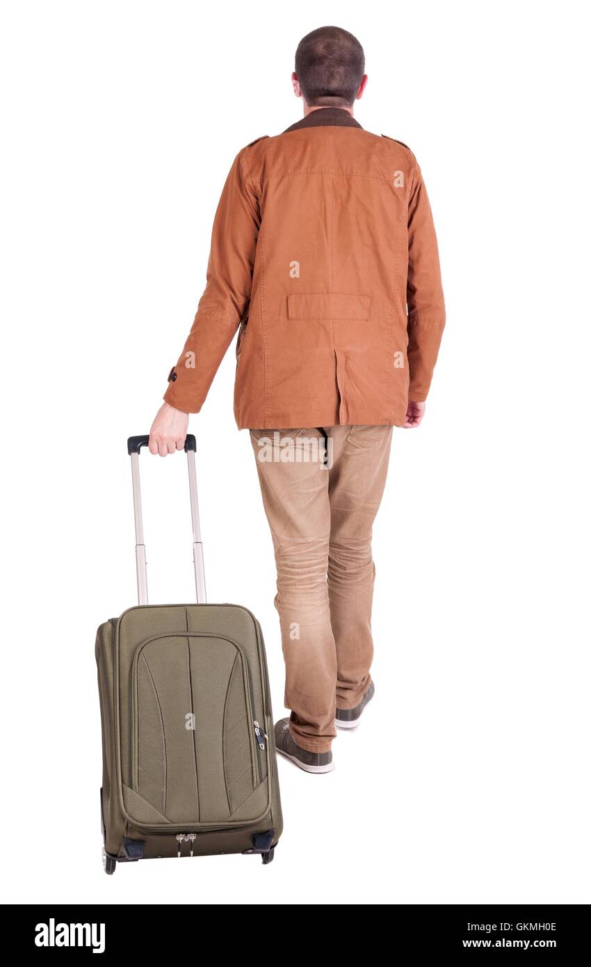 back view of walking man with suitcase Stock Photo - Alamy