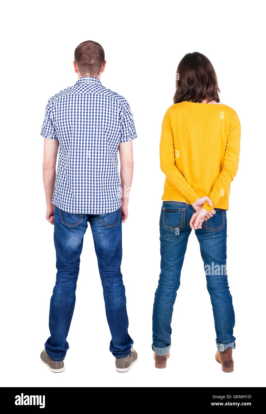 Back view of young couple hug and look into the distance Stock Photo ...