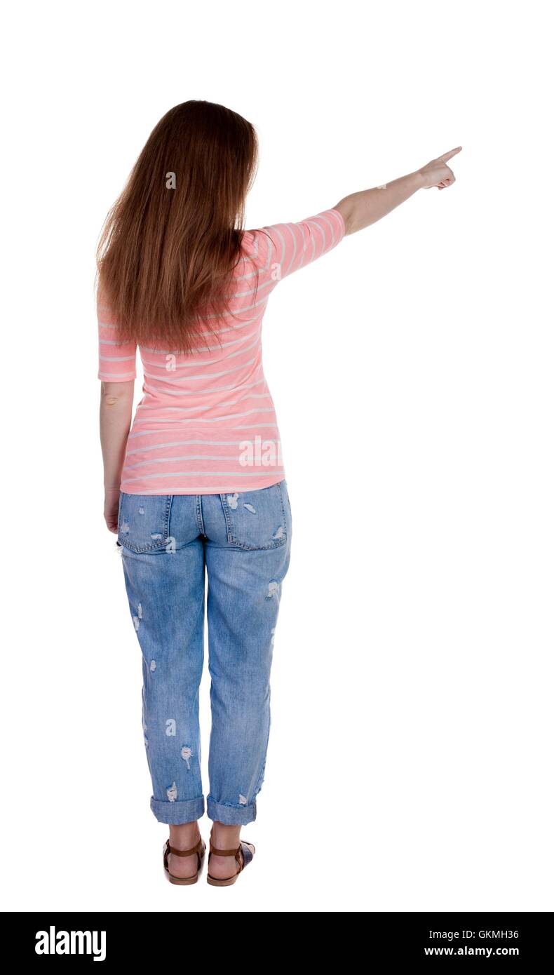 Back view of pointing woman Stock Photo - Alamy