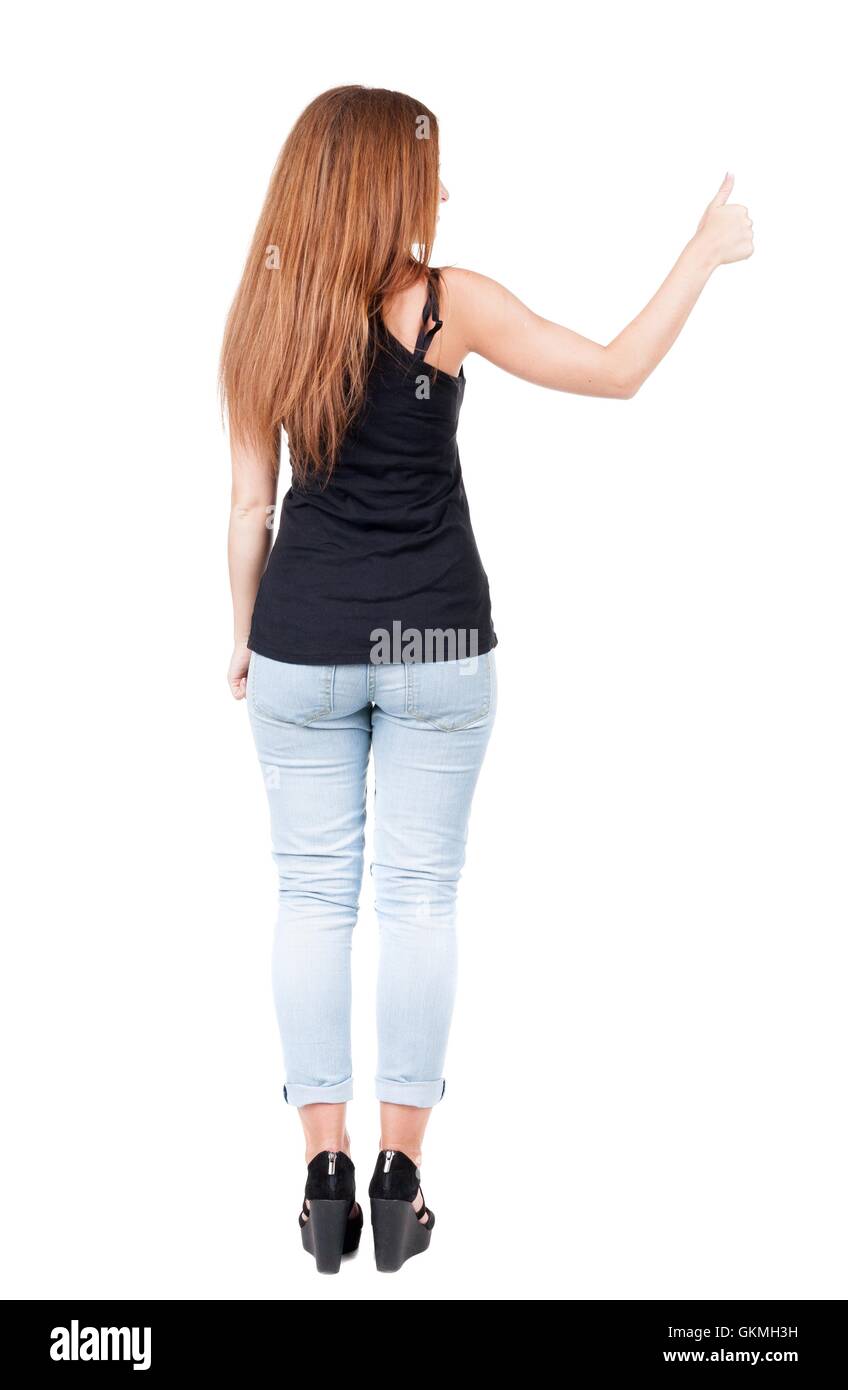 Back view of woman thumbs up Stock Photo - Alamy