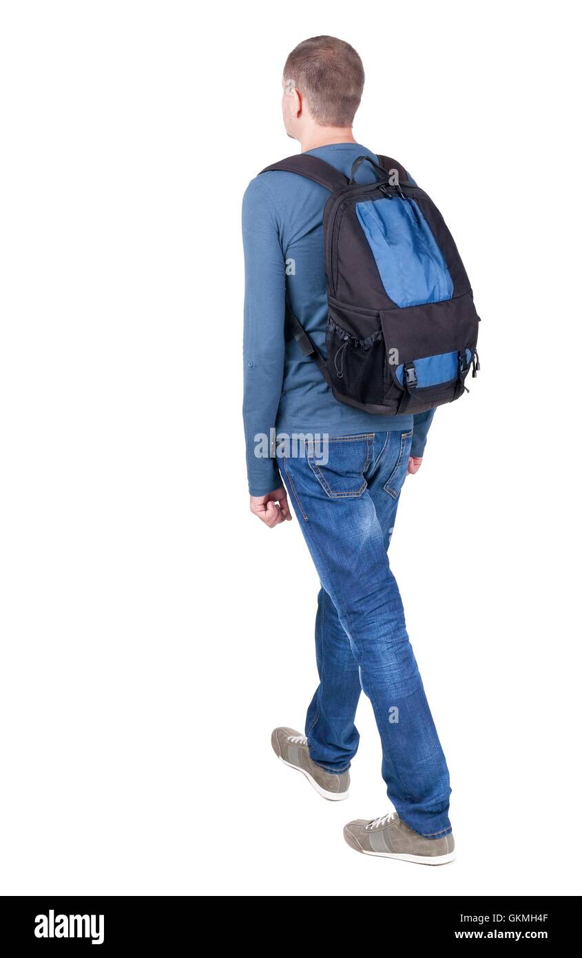 back view of walking man with backpack Stock Photo - Alamy