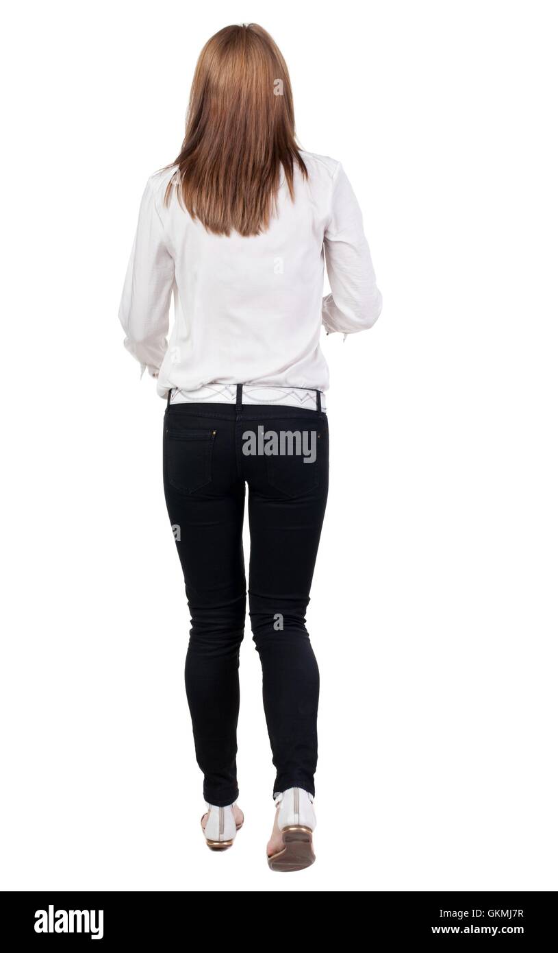 back view of running woman in white shirt. beautiful blonde girl in ...