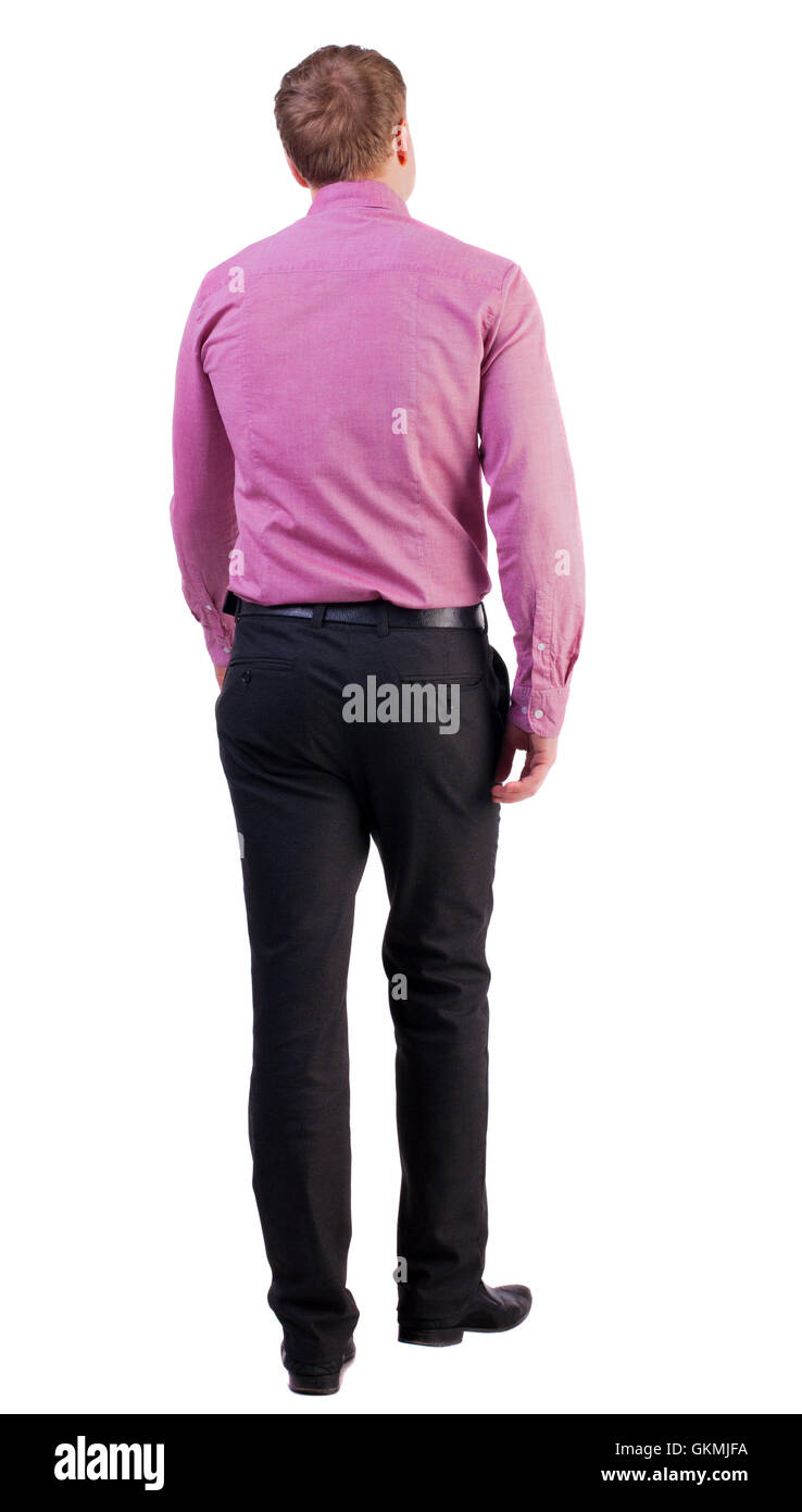 back view of walking business man. going young guy in red shirt ...