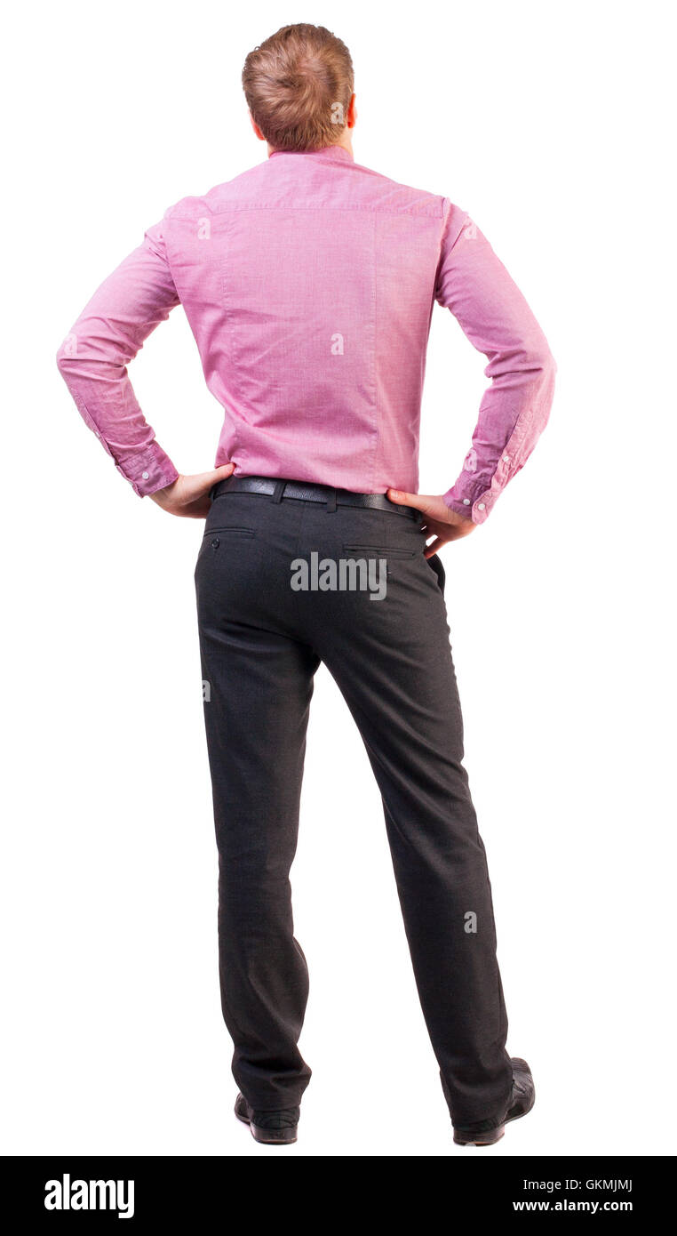 back view of Business man looks ahead. Young guy in pink shirt watching ...