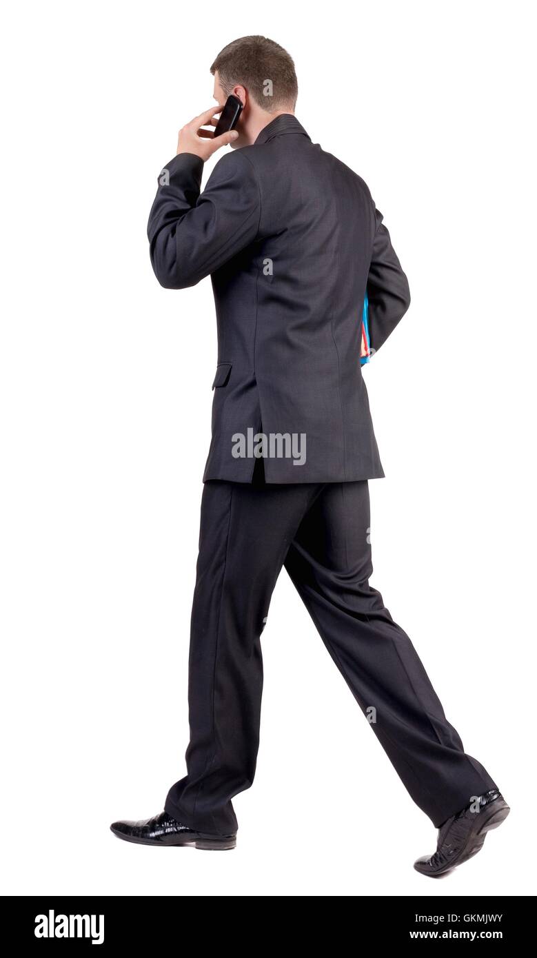 Man In Suit Walking Back View