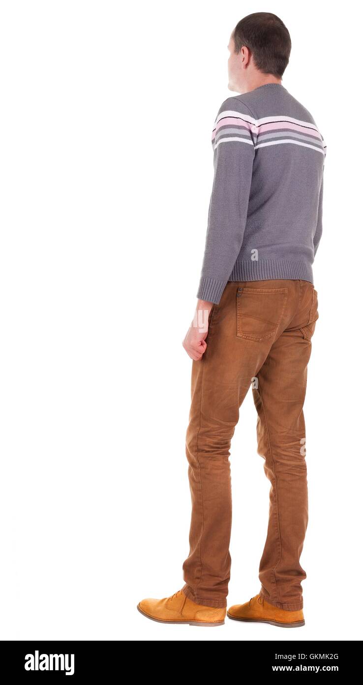 Back view of going handsome man in jeans and sweater. walking young guy ...