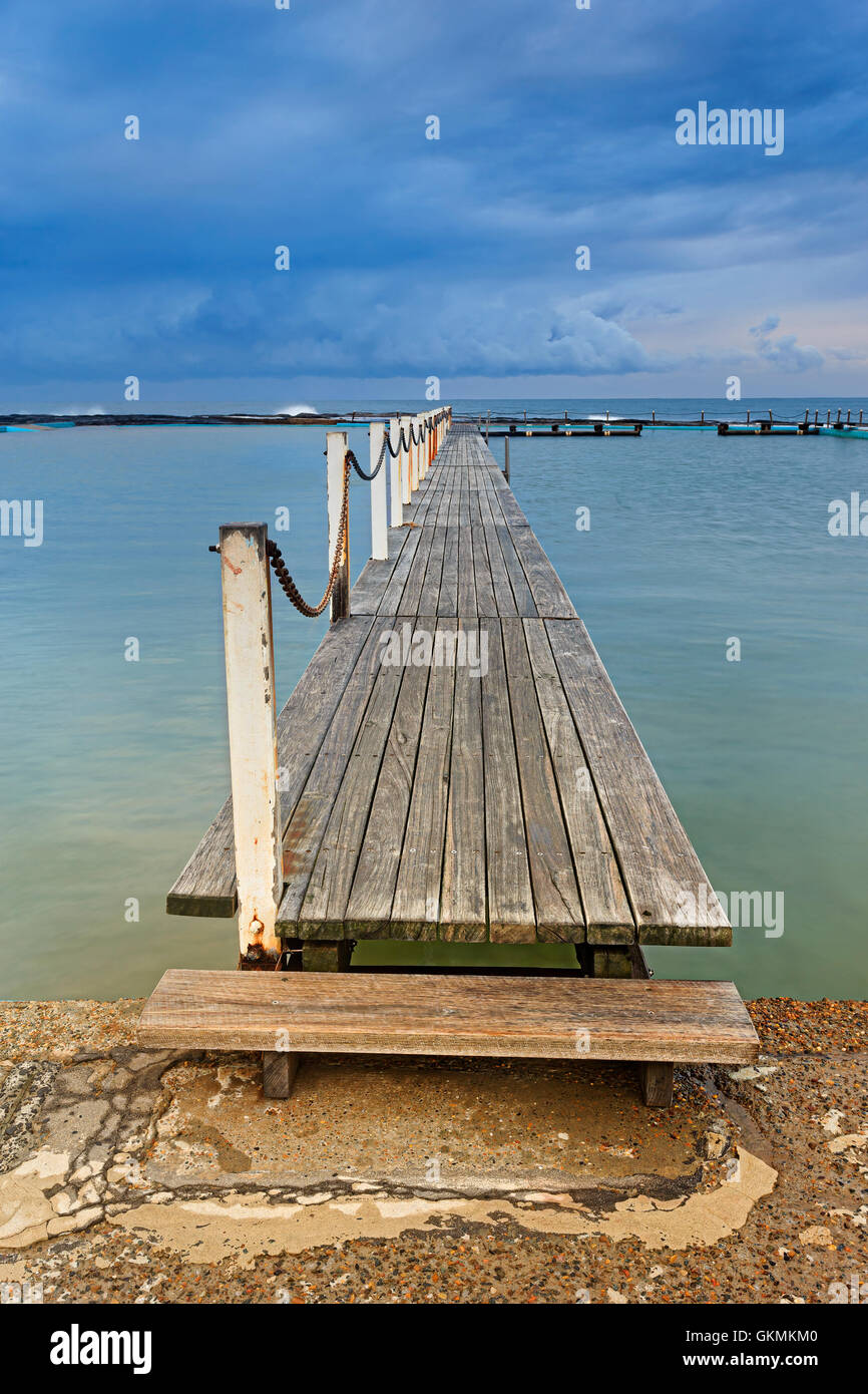 WOoden boardwalk across public Olympic size rock pool at Collaroy ...