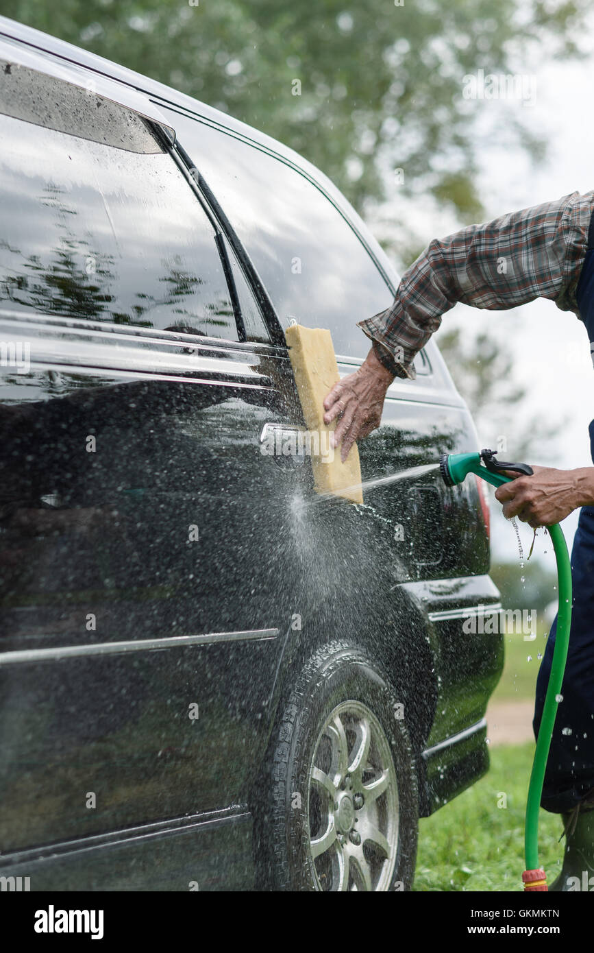 Manual car wash man washes hi-res stock photography and images - Alamy