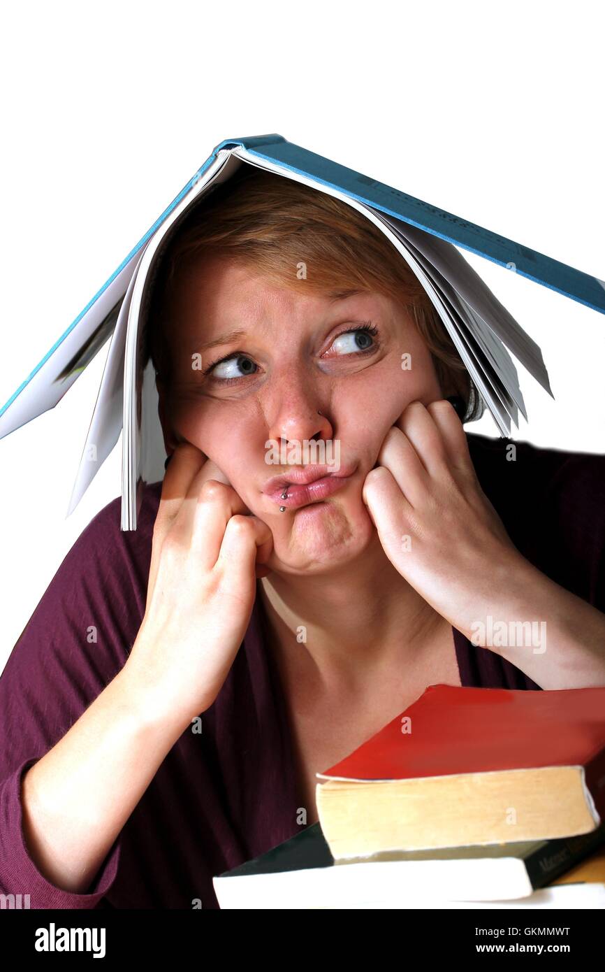 girl with book angry about learning Stock Photo - Alamy