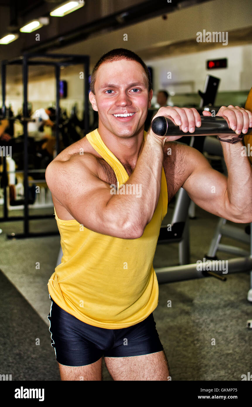 Portrait of handsome bodybuilder in fitness club Stock Photo - Alamy