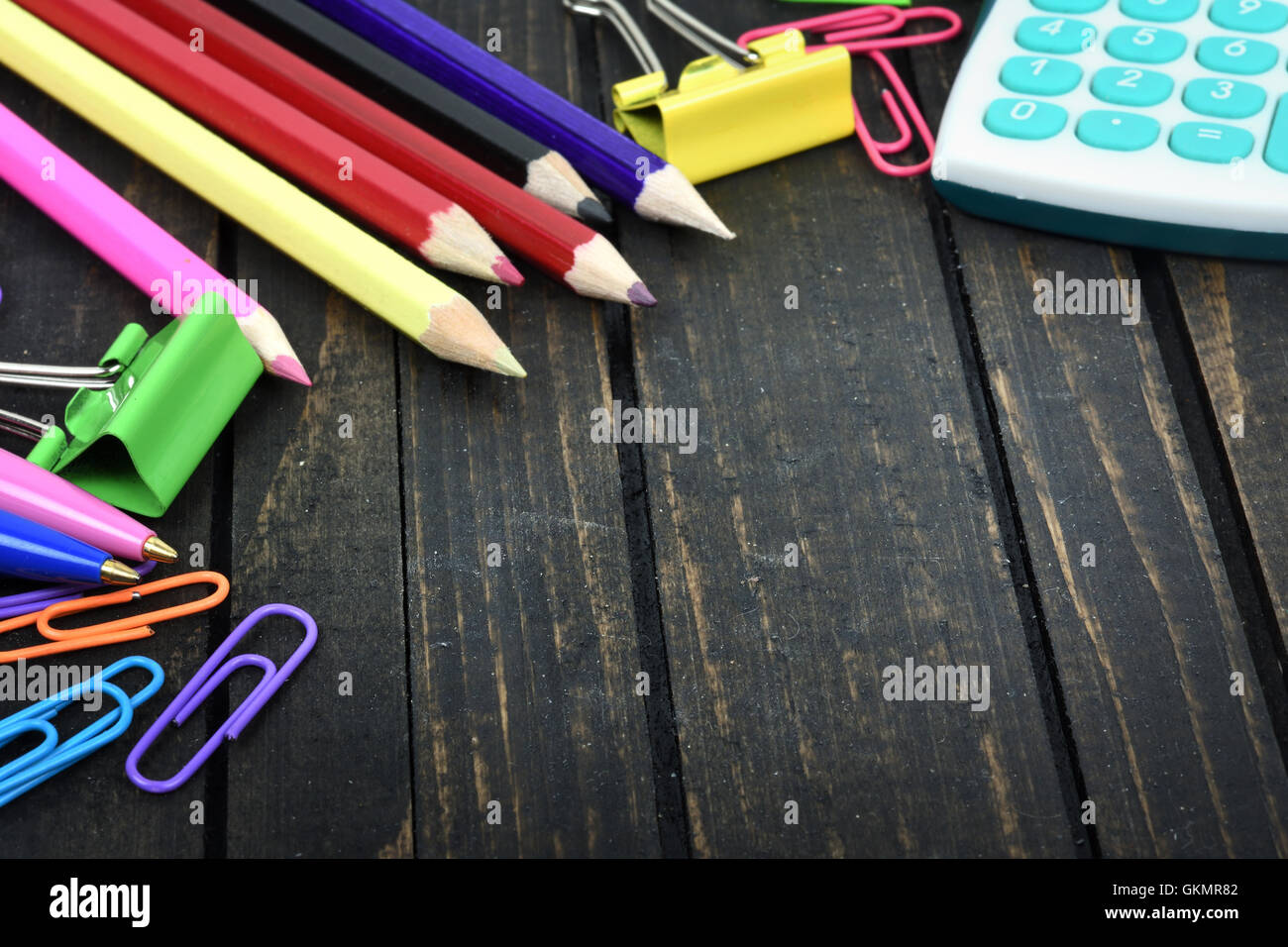 Office tools on wooden table Stock Photo - Alamy