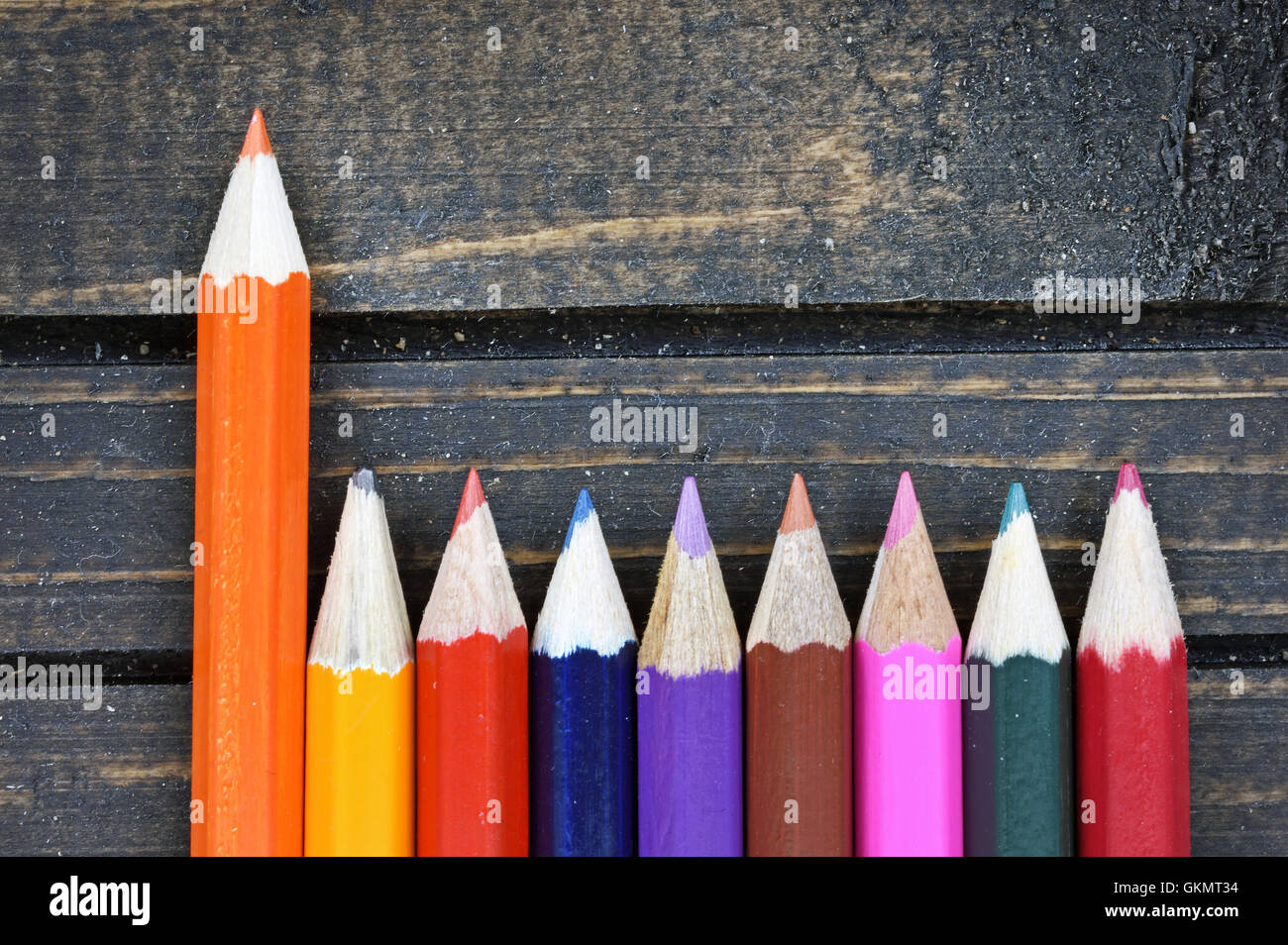 Group of pencil on wooden table Stock Photo - Alamy