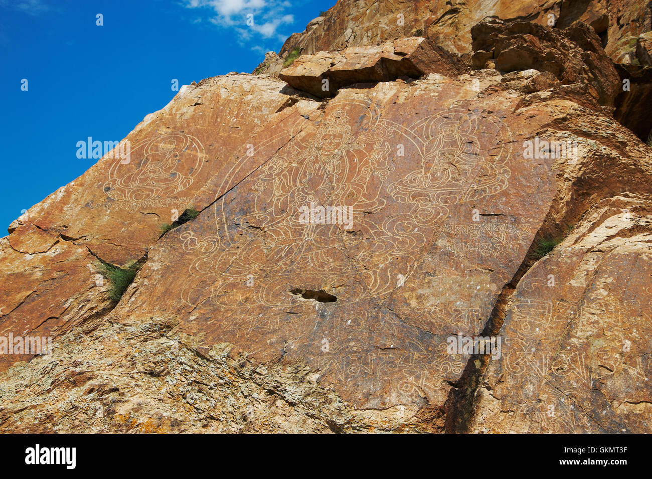 Ancient rock drawings of the Buddha Stock Photo - Alamy
